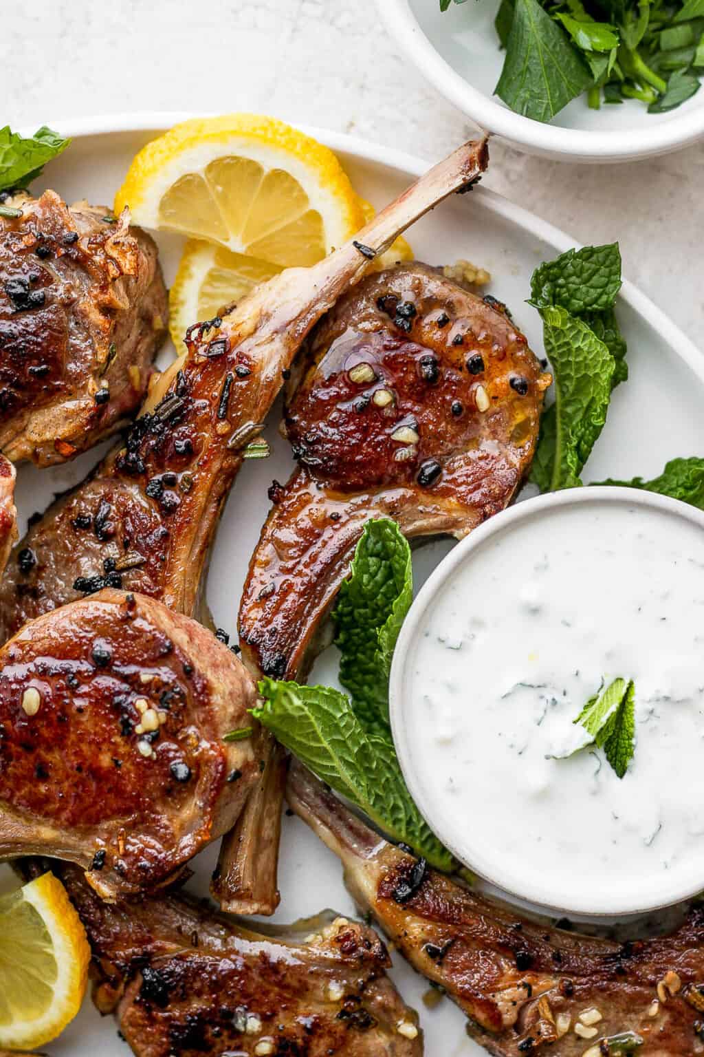 Garlic Herb Lamb Chops + Creamy Mint Sauce - The Wooden Skillet