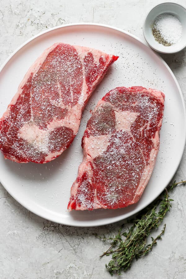 Cast Iron Ribeye Steak with Garlic Herb Butter - The Wooden Skillet